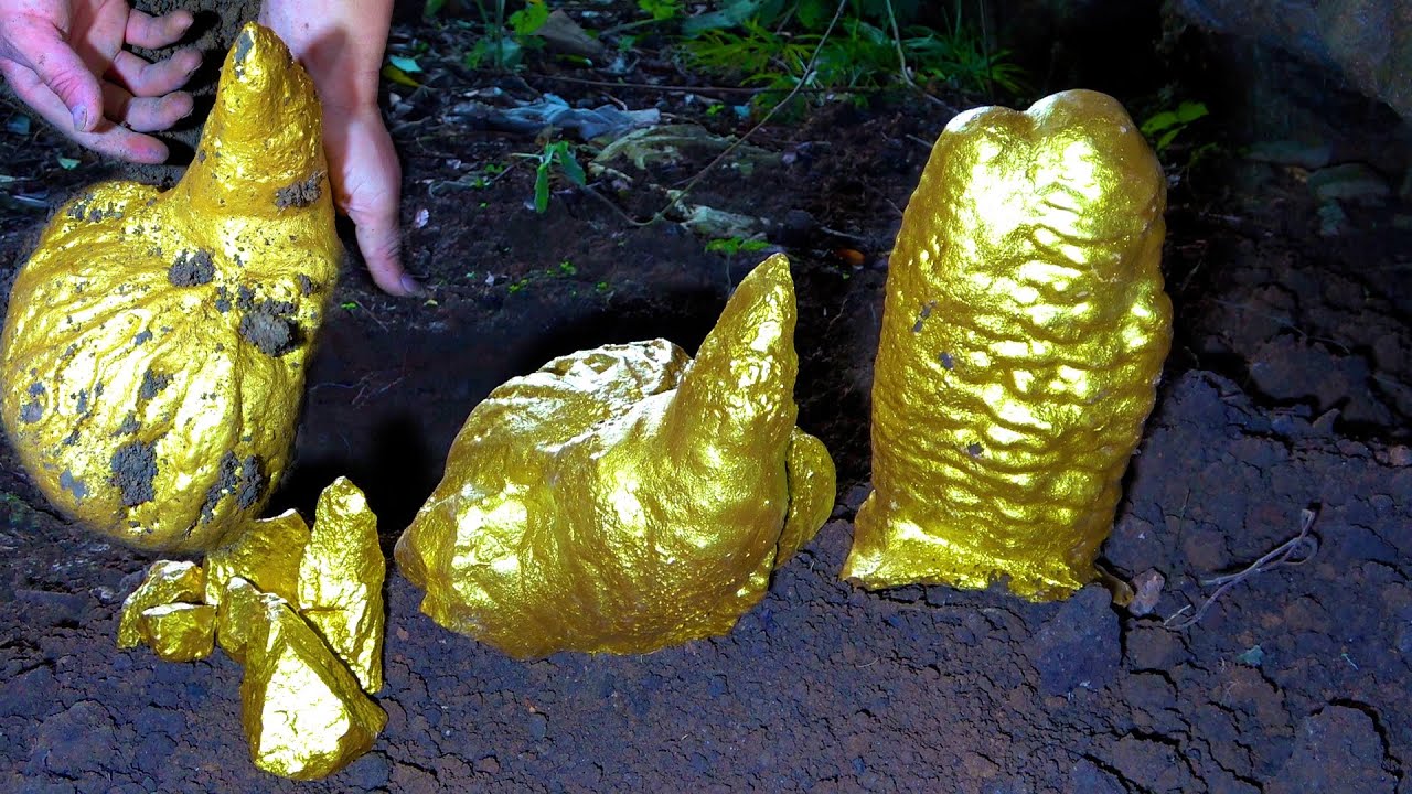The young man found the gold treasure in the cave and easily reached ...