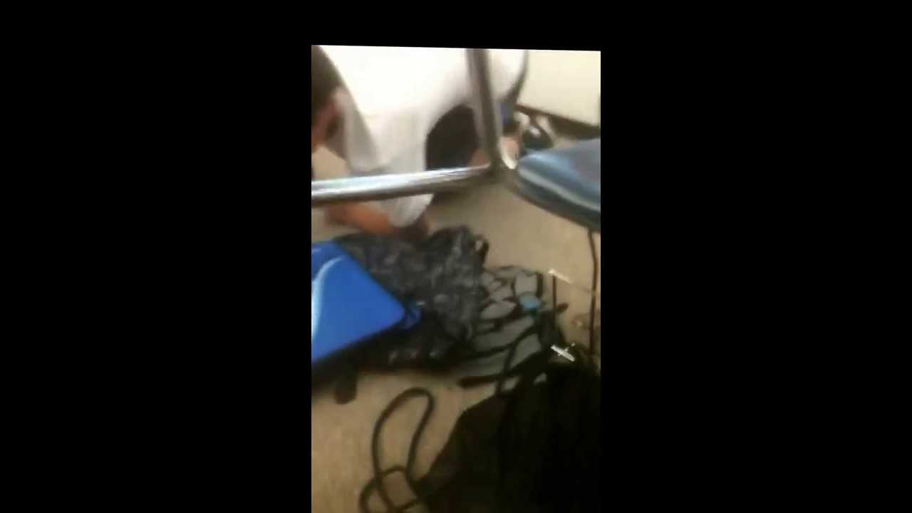 Kid falls out of chair trying to get pencil (middle of class) - YouTube