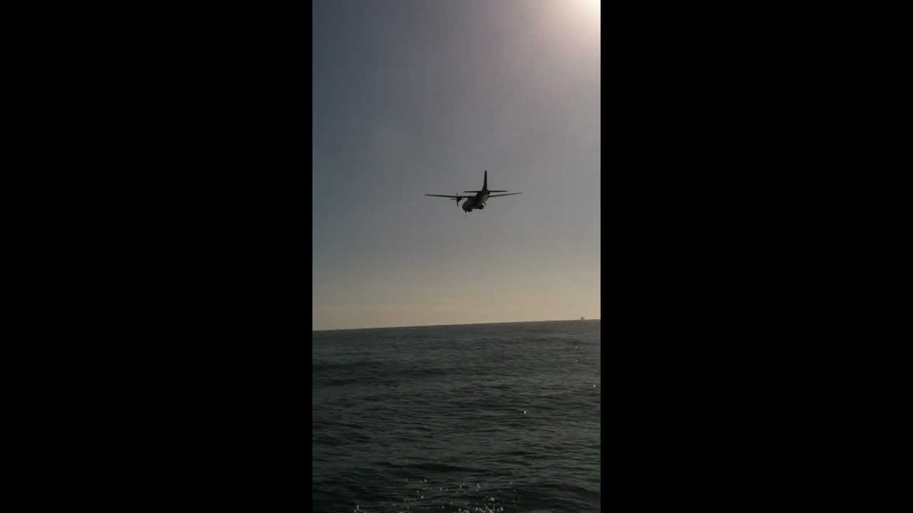 USCGC Bernard C. Webber (WPC-1101) - HC-144A portside flyover - YouTube