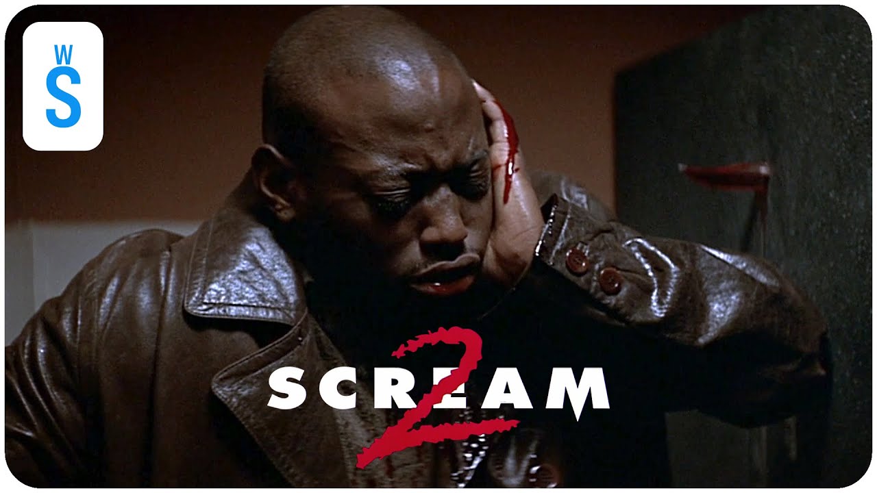 Scream 2 (1997) | Scene: Ghostface sits beside Maureen in Phil's place ...