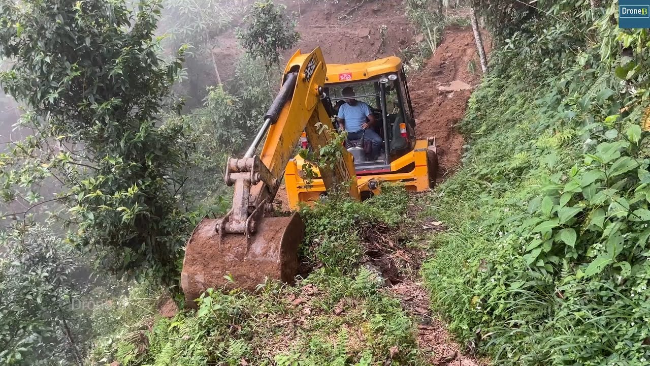 Shortly After Heavy Rain JCB Backhoe Building Logging Deck Narrow Road ...