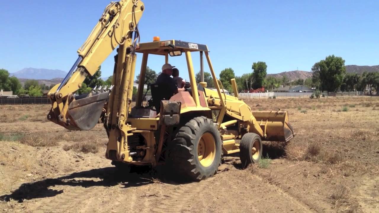 Cooper and The Backhoe - YouTube