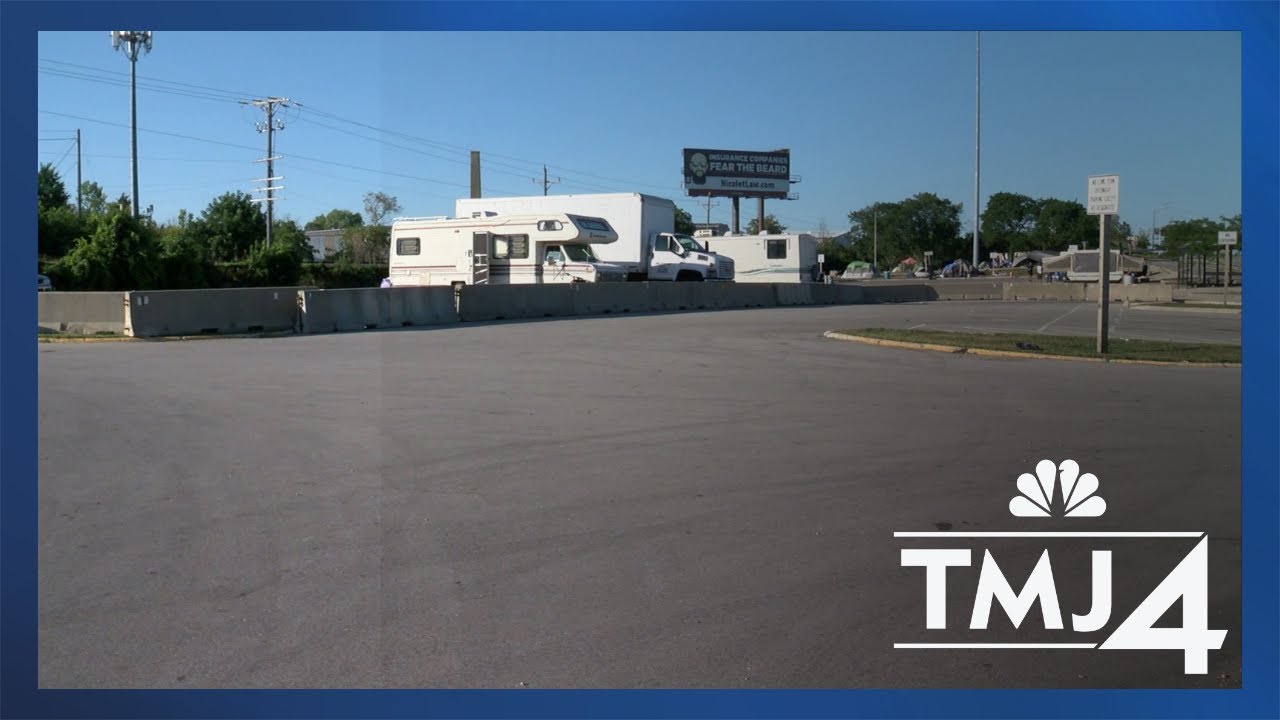 DOT adds concrete barriers to park-and-ride lot to prevent people ...