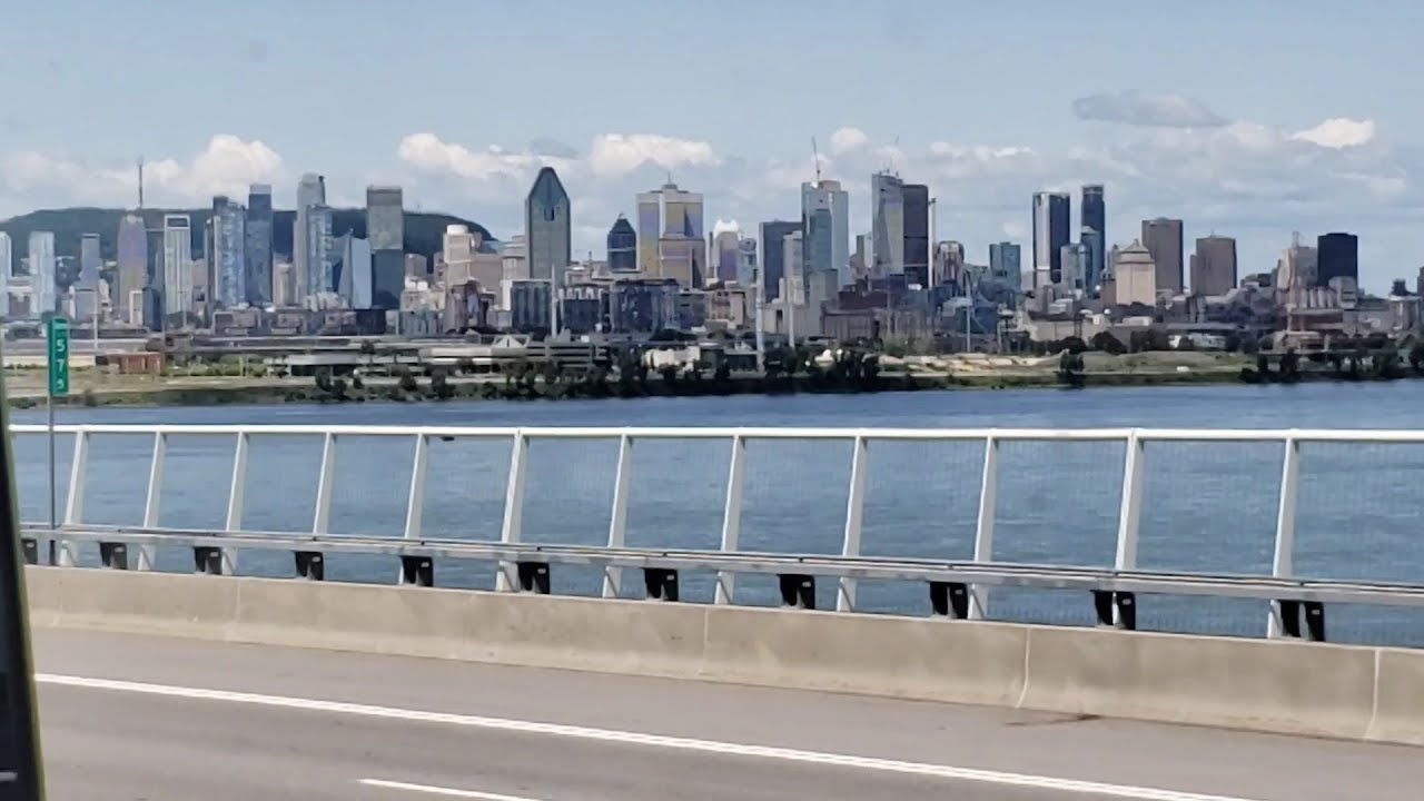 MONTREAL REM Ride Views of Montreal Skyline Over Champlain Bridge - YouTube