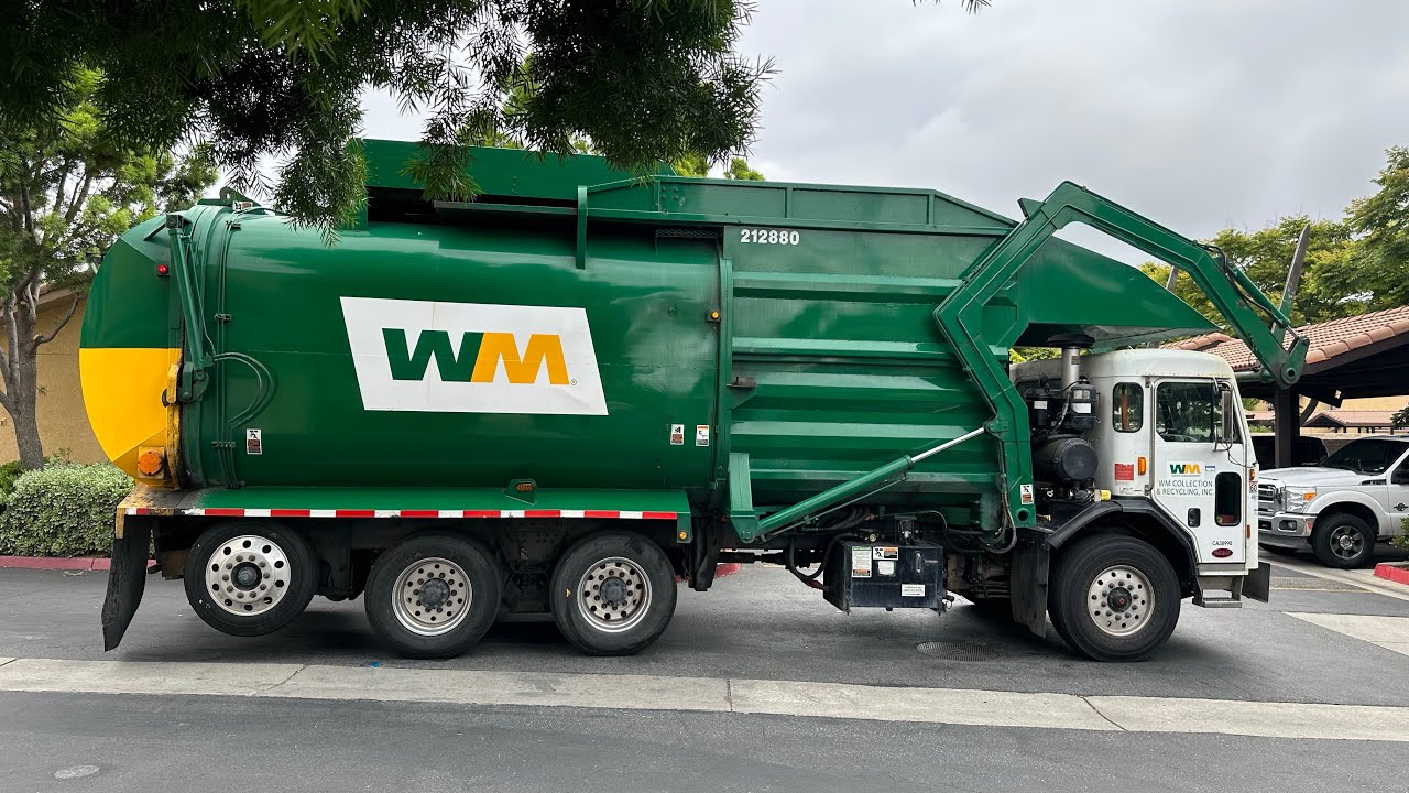 Waste Management Peterbilt 320 Amrep FL Doing Post Memorial Day Trash ...
