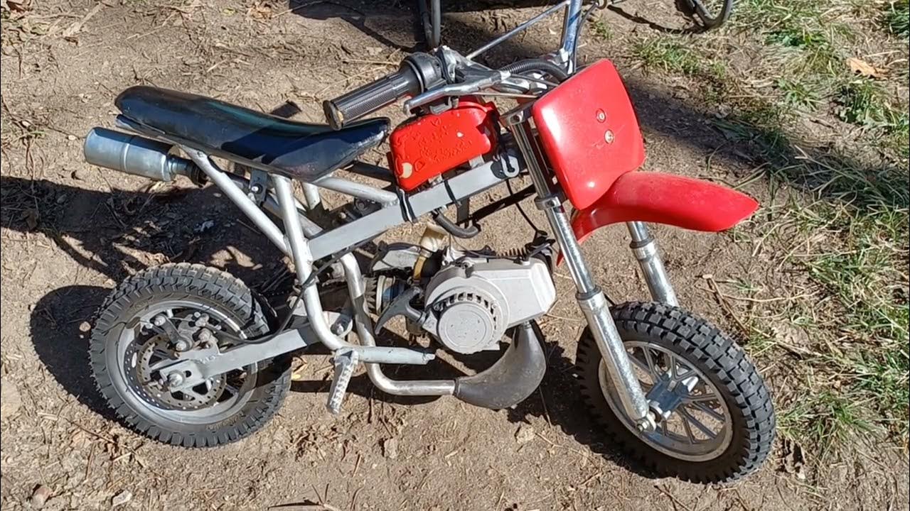 His first gas-powered 50 cc Bike - YouTube