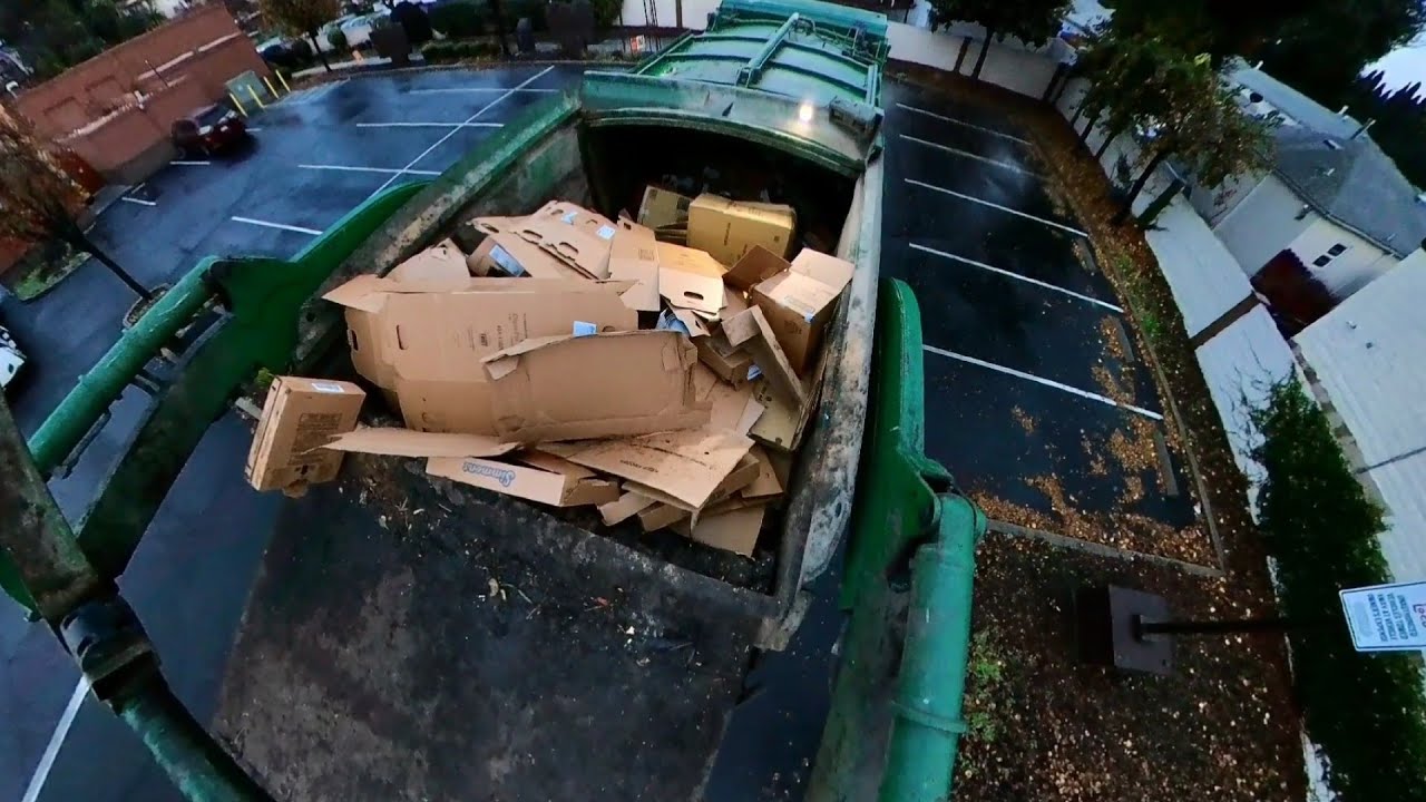 Waste Management Garbage truck packer cycling. - YouTube