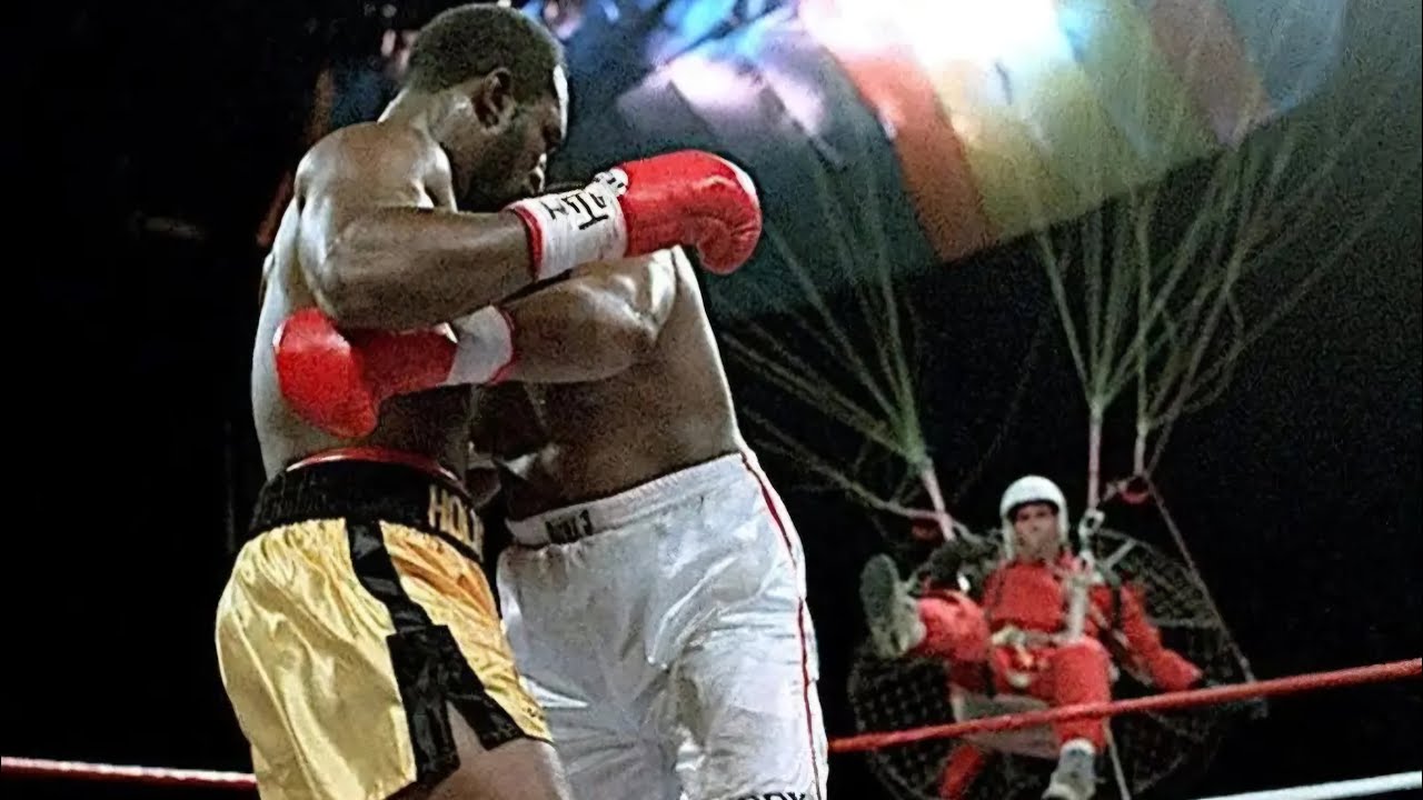Evander Holyfield vs Riddick Bowe 2 Highlights - A Parachute Land In ...