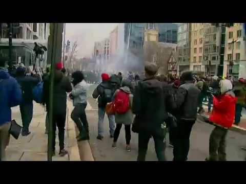 Police use flash bang grenades to disperse protesters in the area of ...
