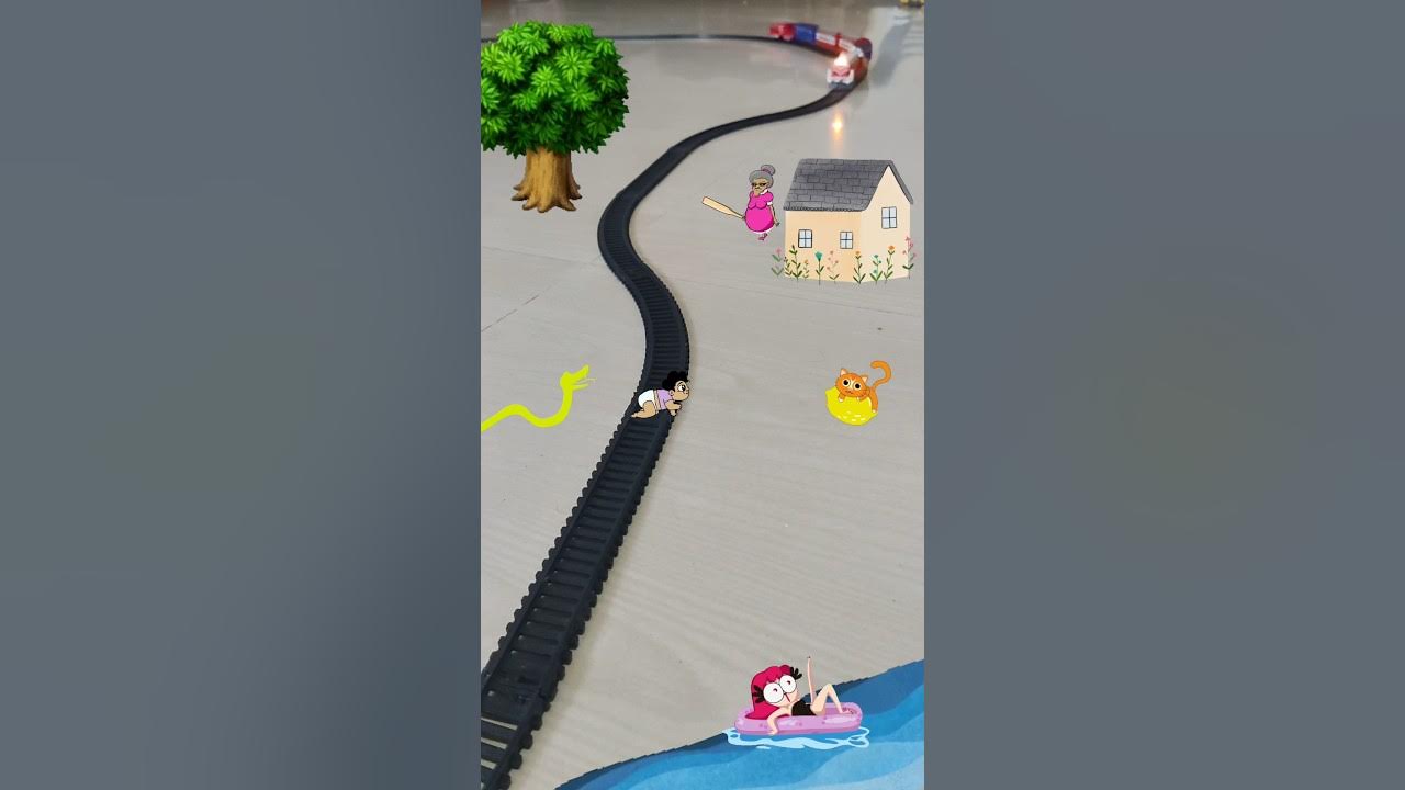Snake following baby on the railway track and train is approaching fast ...