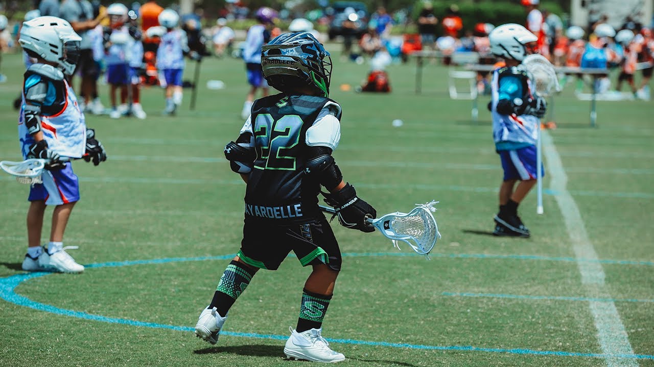 6 year old goes Beast Mode in youth lacrosse games - YouTube