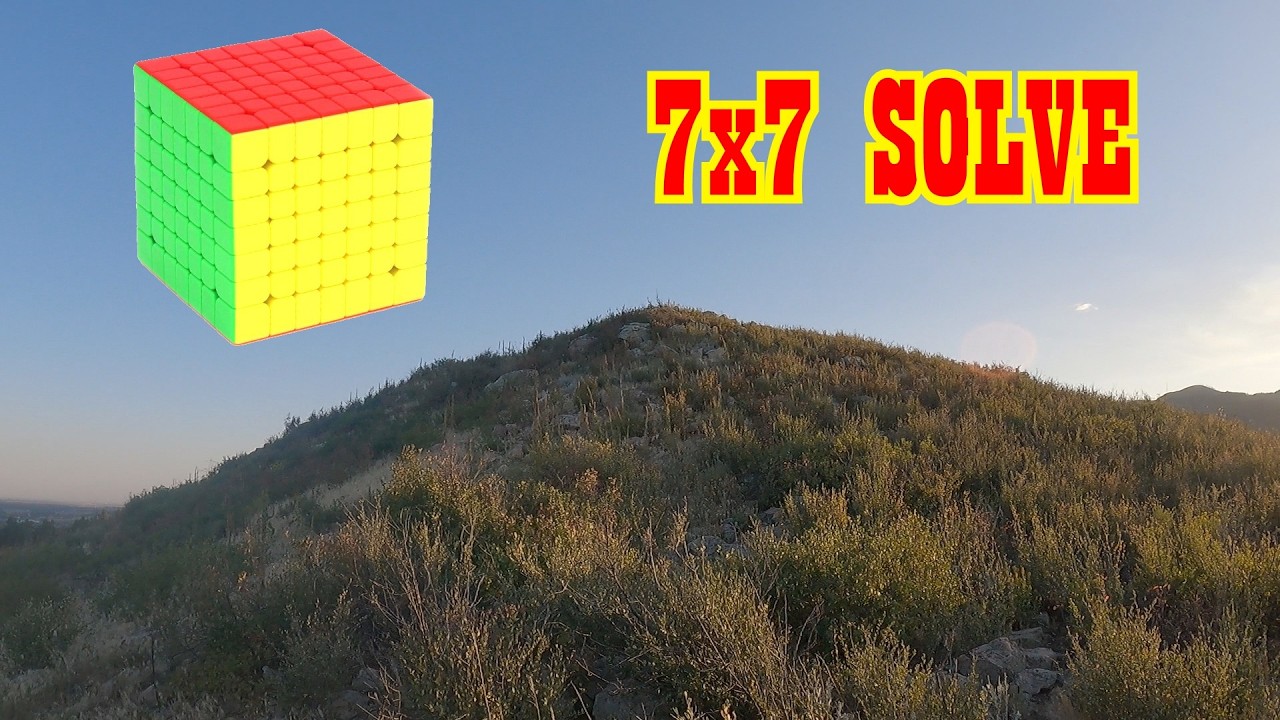 Solving a 7x7 at the Top of a Mountain during Sunset - YouTube