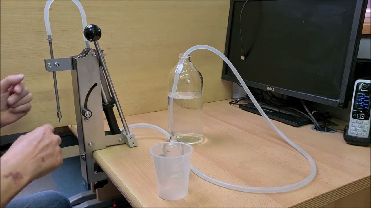 PLF 100 Manual Perfume Filling Machine - YouTube