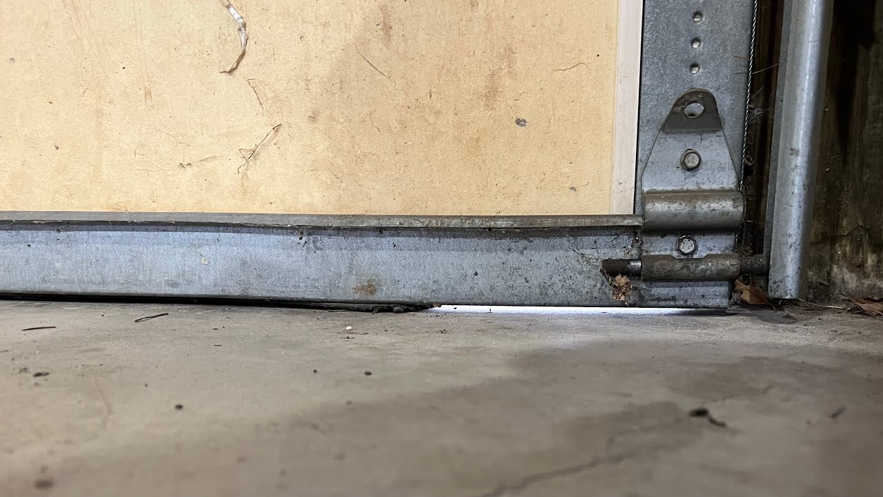 Snirt Stopper installation - sealing shop door to save money - YouTube