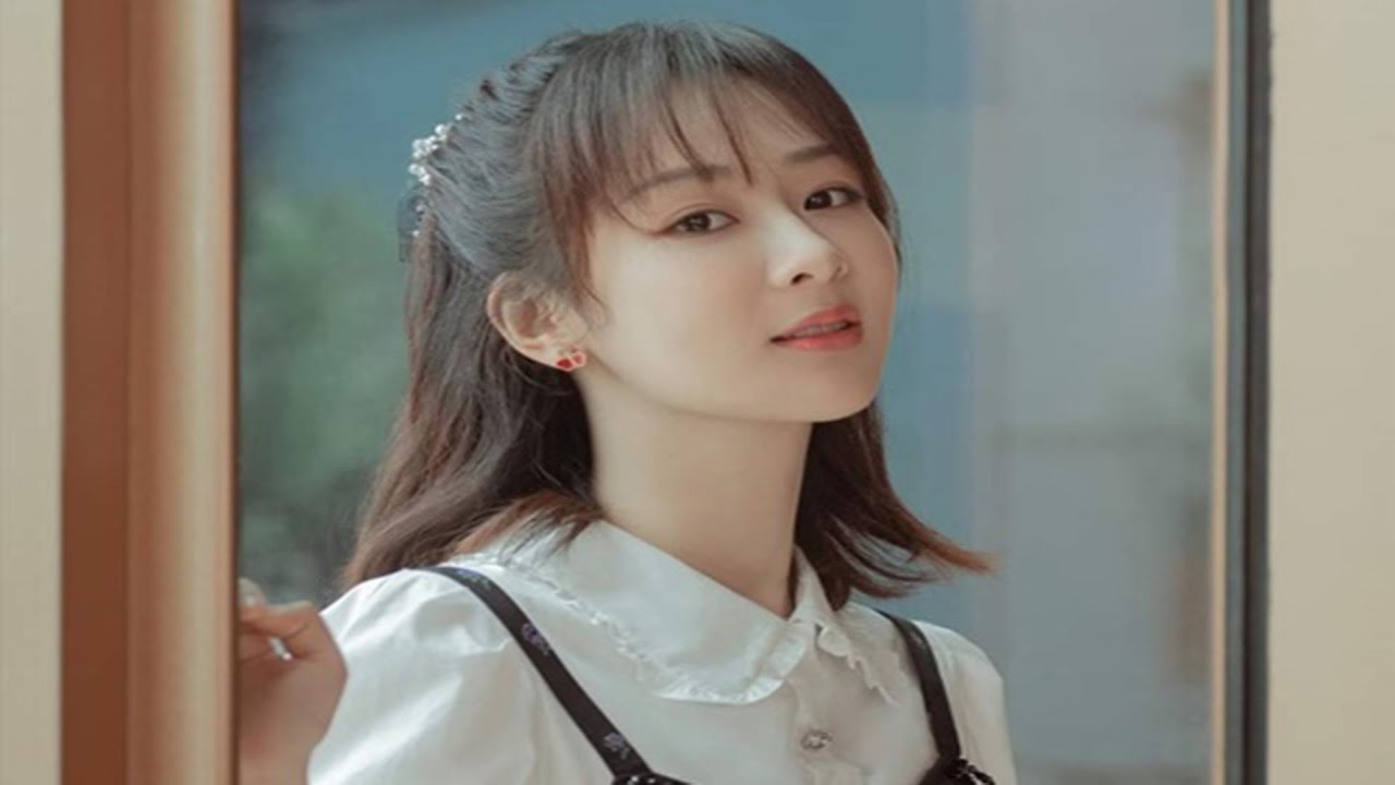 Yang Zi wore a semi open red dress for a magazine shoot, showing off ...