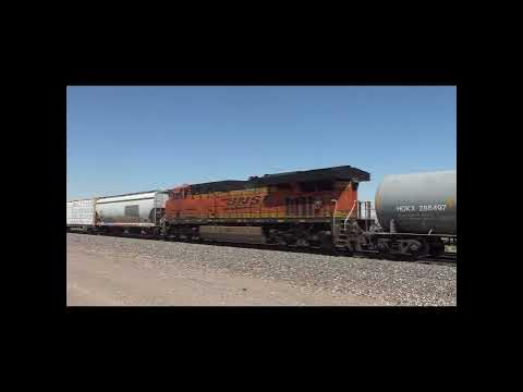 BNSF 7480 chugging away on mid train duty - YouTube
