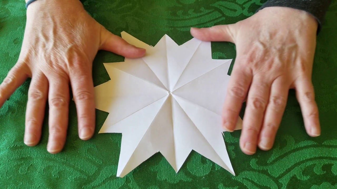 How to make a 6 sided paper snowflake. Demonstrated by special guest ...