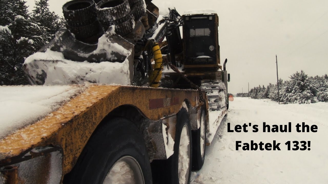 Hauling a Fabtek FT 133 wood harvester with the Western Star !! - YouTube