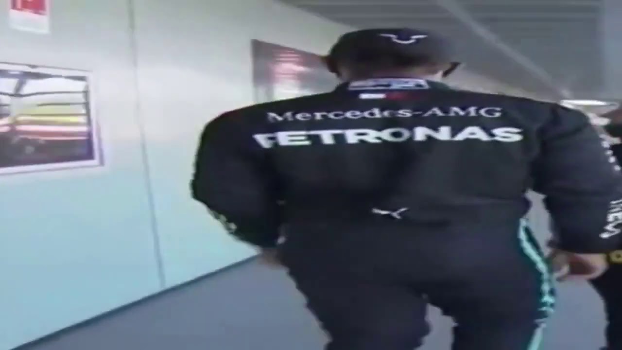 Wide Lewis Hamilton walking out of the stewards' room but he's always ...