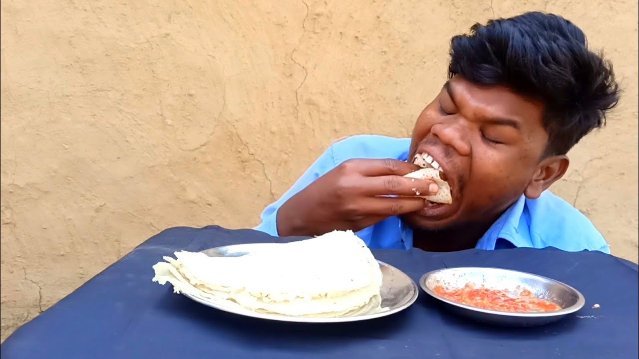 chila roti eating | chela roti eating | eating - YouTube