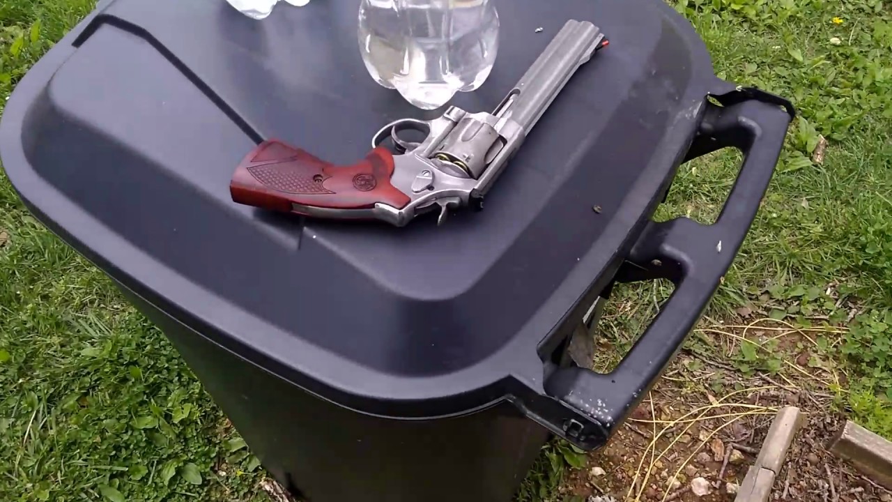 Can revolver cylinder gap blast bust a 2 liter bottle? - YouTube