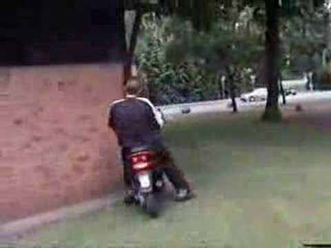 Epic Fail: Moped / Scooter Crashes into a wall - YouTube