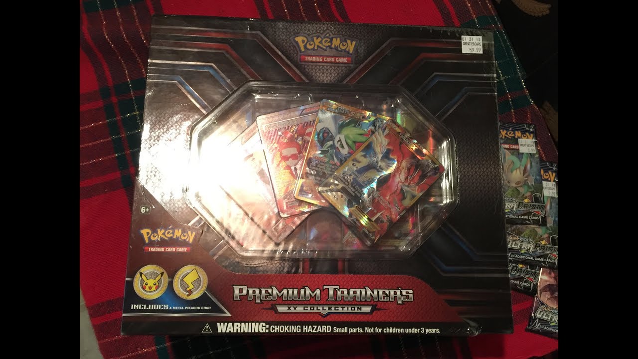 Opening a Pokemon XY Premium Collection Box + 4 Ultra Prism Packs ...