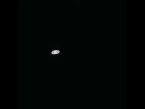 Saturn through my 8" reflector telescope - YouTube