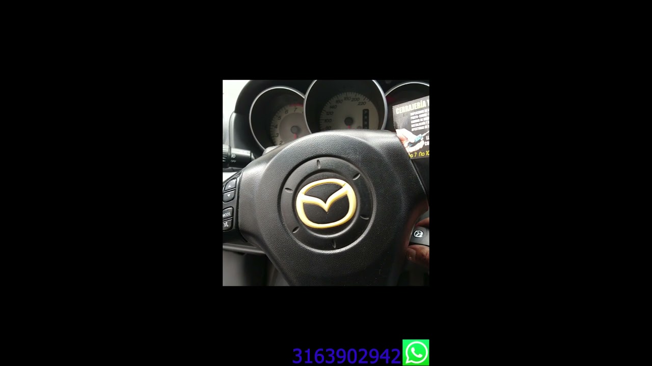 Programación control MAZDA 2 - YouTube