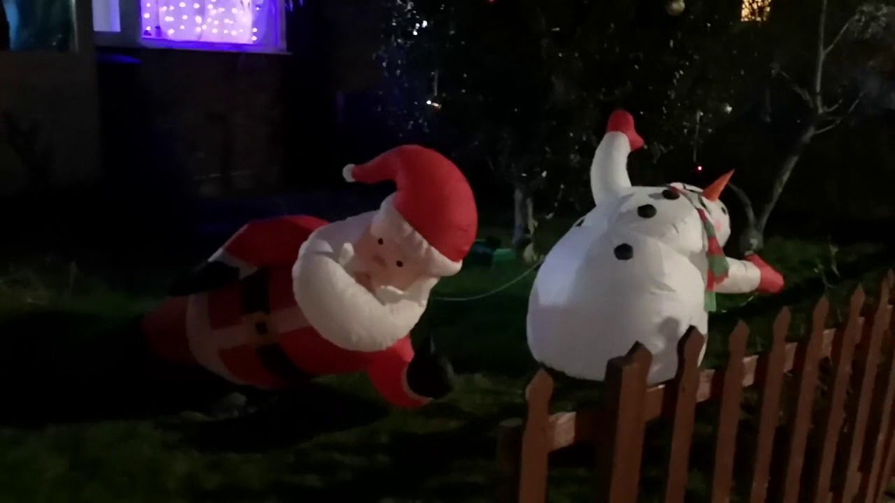 Deflating Santa and the snowman - mesmerising - YouTube