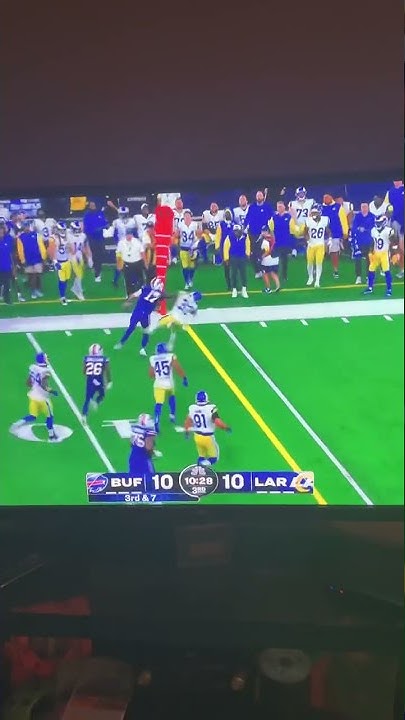 Josh Allen big stiff arm on the rams defense - YouTube