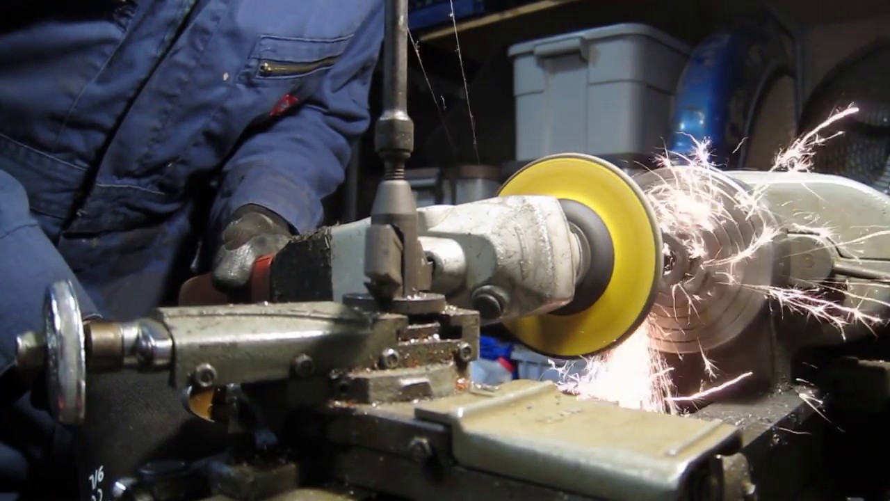 Disc grinding spacers for a R100R swingarm bearing - YouTube