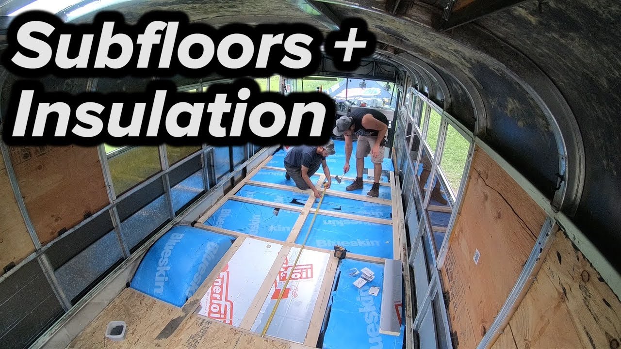 INSTALLING SUBFLOORS AND INSULATION !! - YouTube