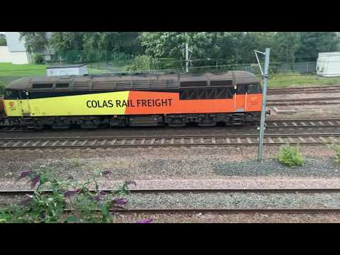 Colas Class 56090 with ballast wagons passes Darlington on Millerhill ...