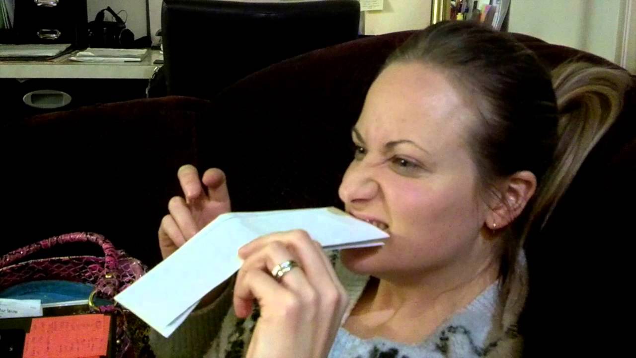 Girl gets paper stuck to lip - YouTube