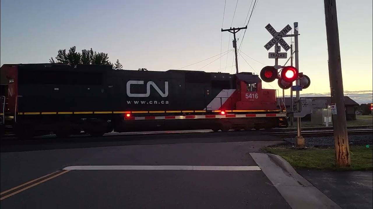 CN 5416 NB "Woodtick" L563 arrives to Ladysmith on 8-3-22 - YouTube