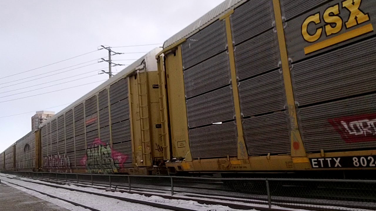 CN 271 w/ CN 5442 & IC 1019 hooked E.S. lead this long WB Autorack ...