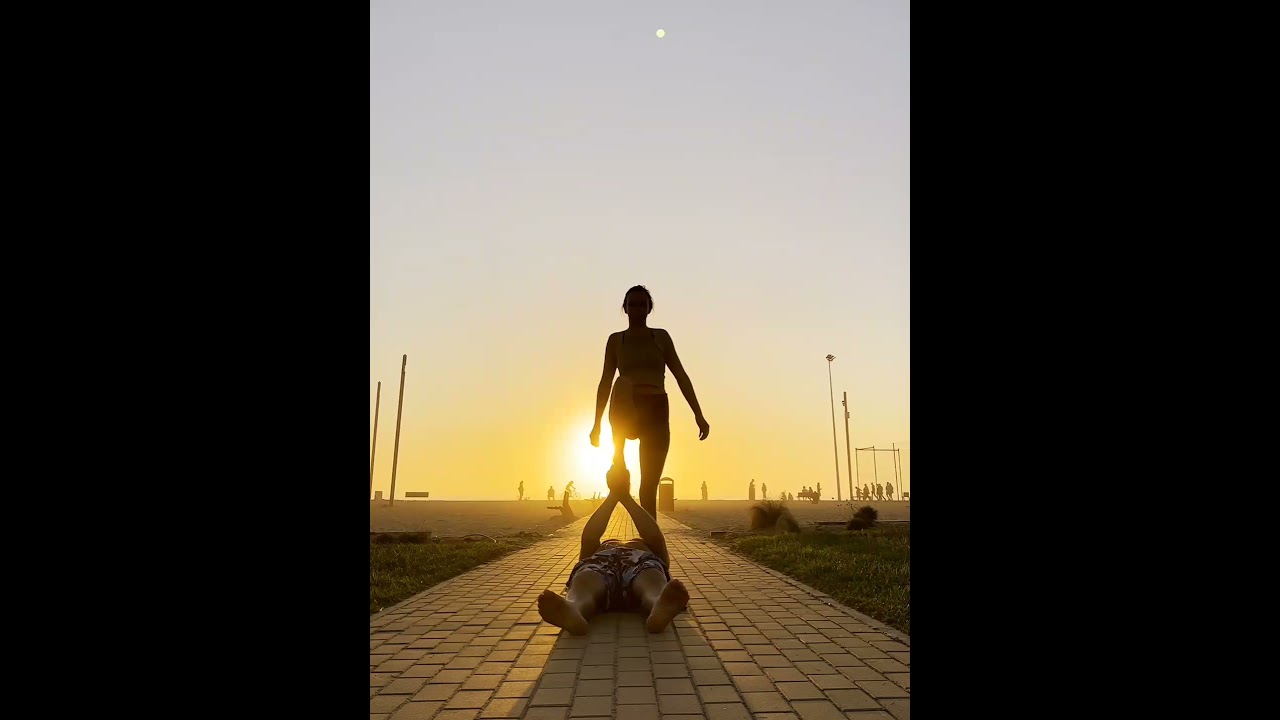 Stunning sunset acro split! - YouTube