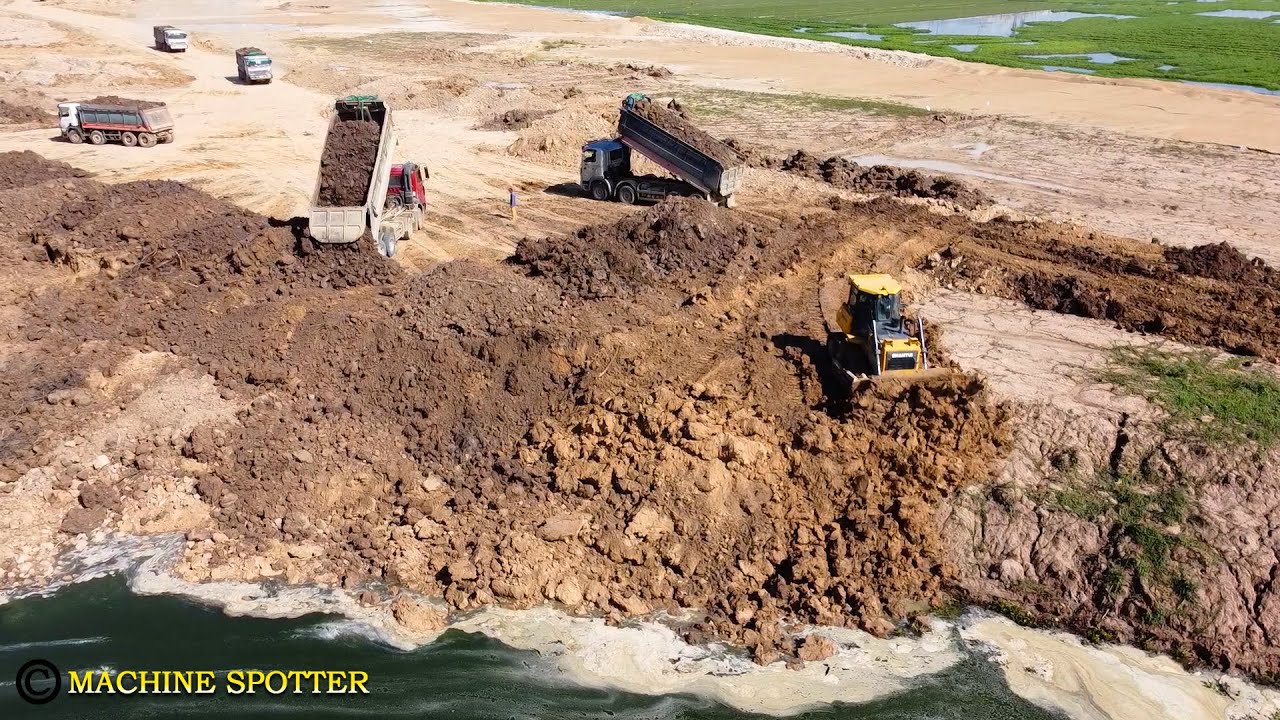 Bulldozer Working Push The Ground And Amazing Dump truck Spreading Soil ...