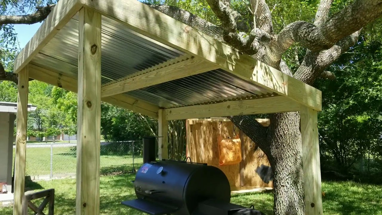 Building a BBQ pit deck with slant roof cover - YouTube