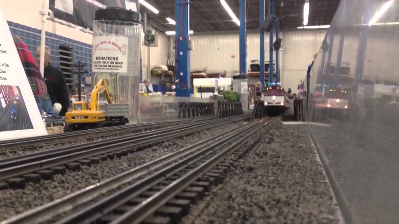 An O scale MBTA commuter train. - YouTube