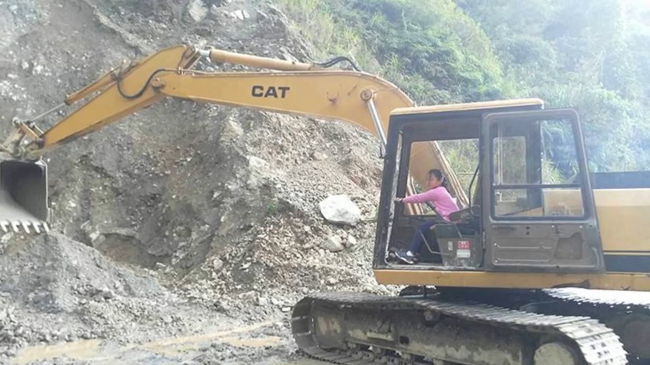 WATCH: 8-year-old girl operates backhoe in Ifuga - YouTube