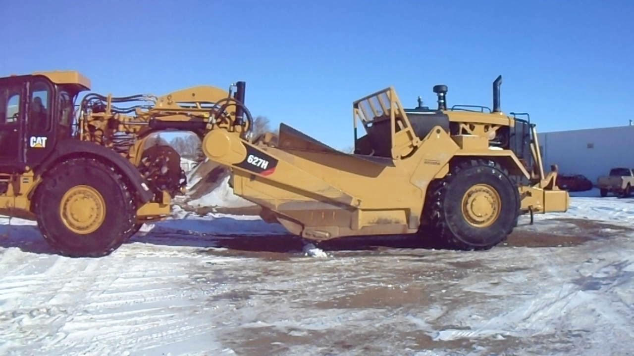 2014 CAT 627H Wheel Scraper - YouTube