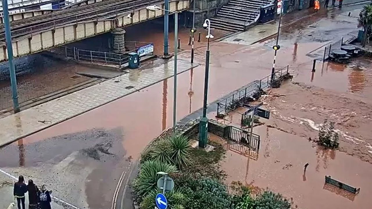 Flash flooding submerges coastal town as Met Office issues rare amber ...