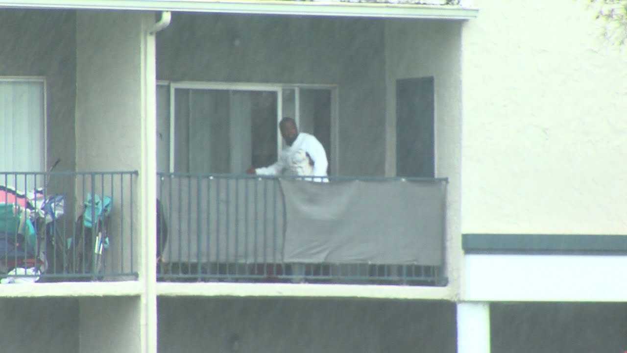 Barricaded man throws objects at police officers, intense standoff in ...