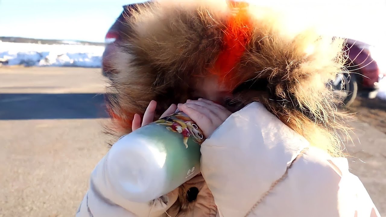 A Cute Little Eskimo Takes a Long Drink of Water at a Rest Stop - YouTube