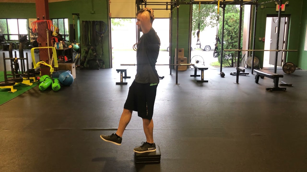 Heel tap off low step - YouTube