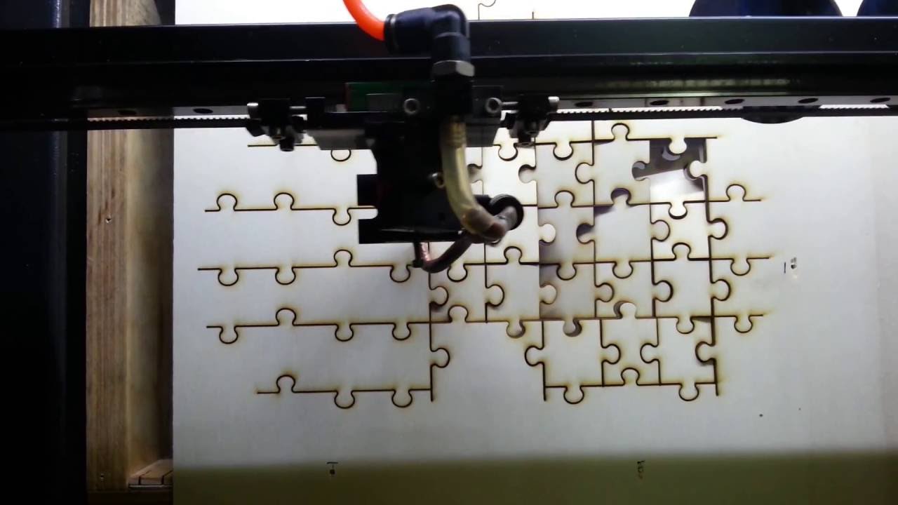 Wooden puzzle laser cutting - YouTube