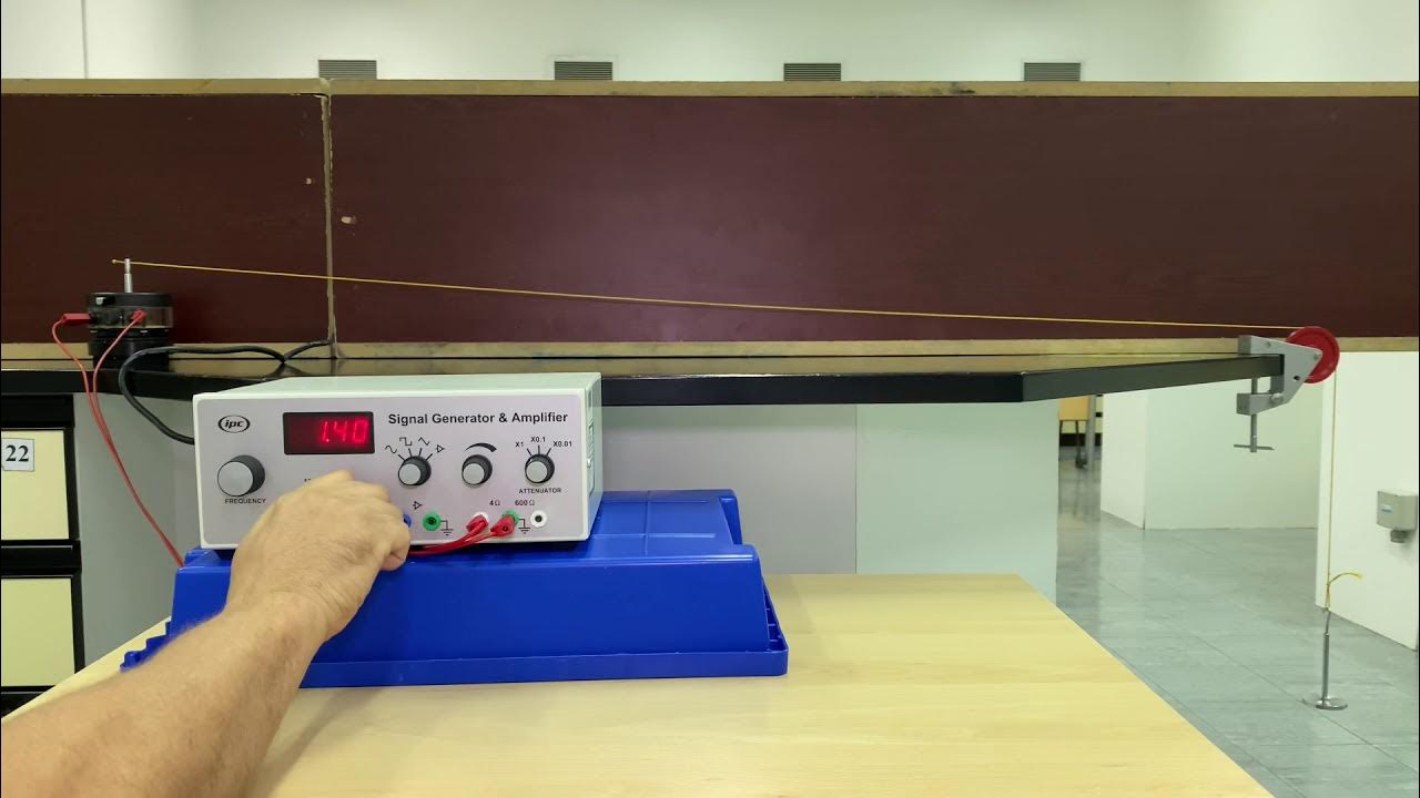 Melde's experiment - standing waves on a vibrating string - YouTube