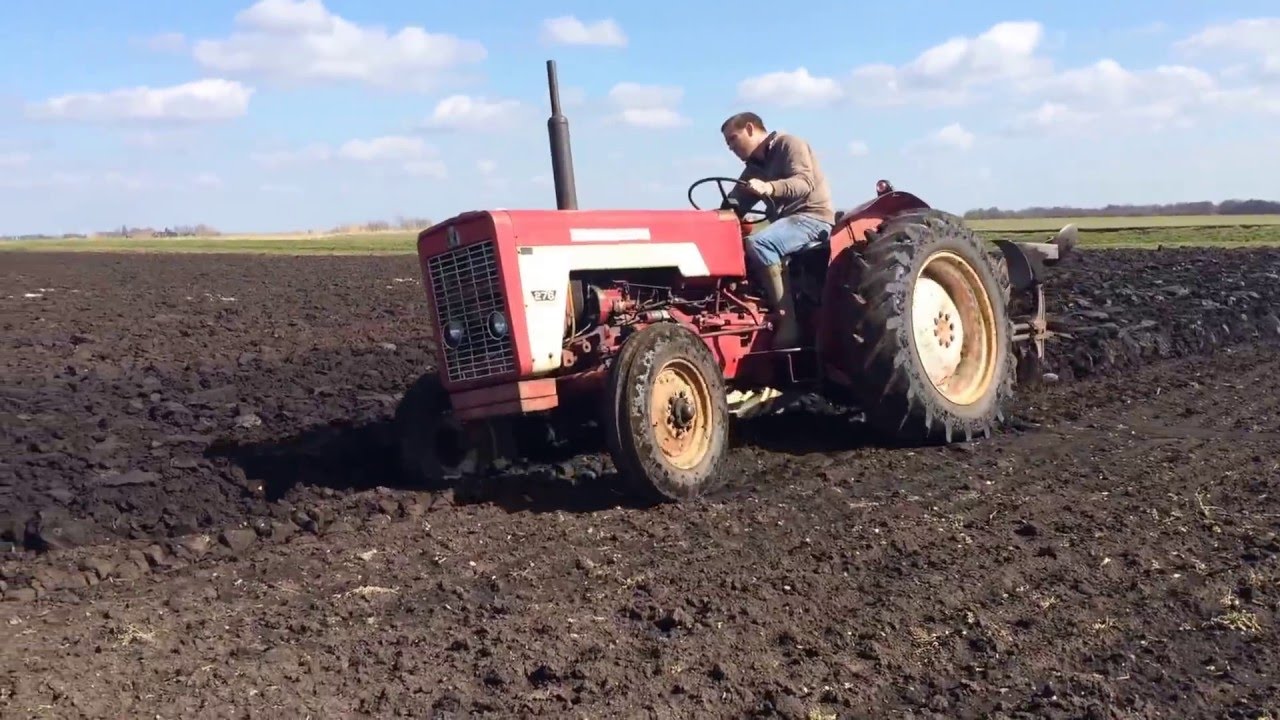 McCormick IH 276 with MF 797 two-furrow reversible plough - YouTube